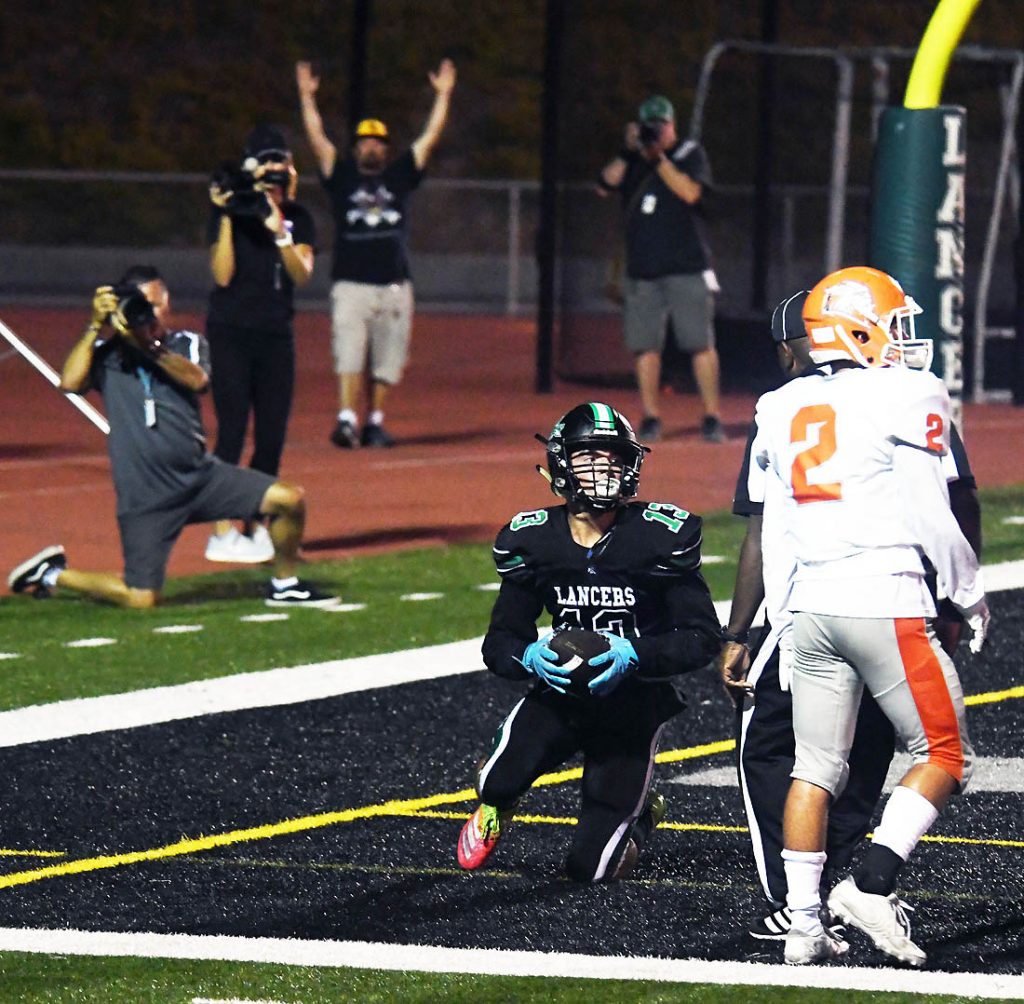Lancers rush past Norsemen, 27-13, to remain undefeated on season | The ...